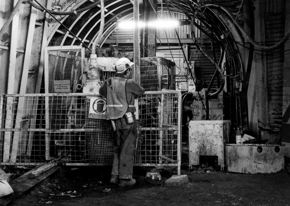 In this shot the engine winder is waiting for the signal to bring men ...